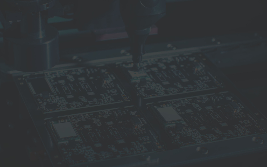 Close up view of circuit board machine overlay - Invention House