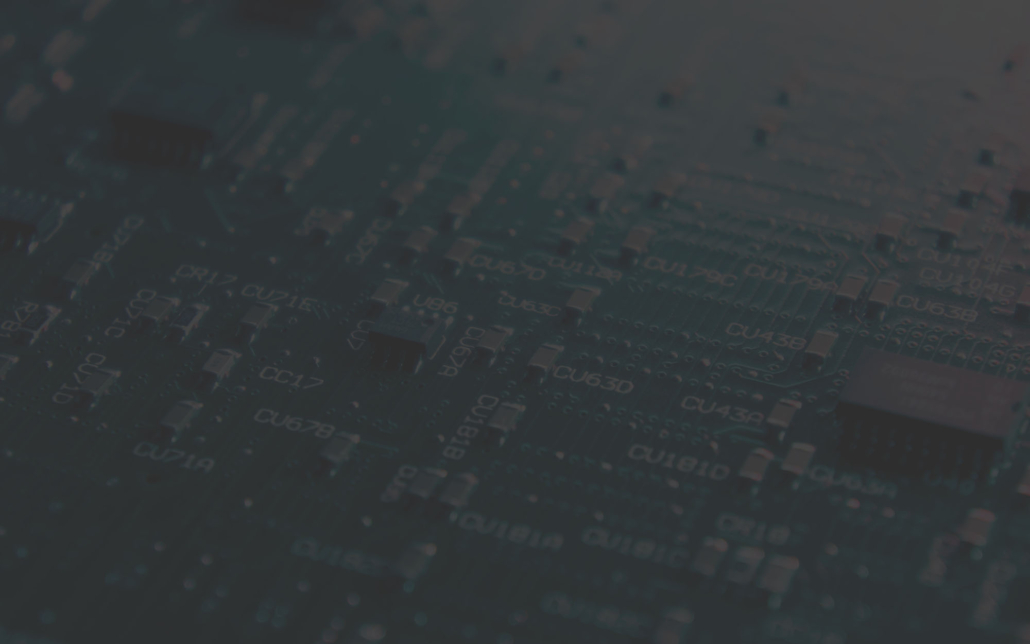 close up view of dark green circuit board overlay - Invention House